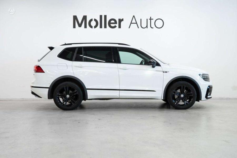 White Volkswagen Tiguan Allspace 2021 in Vilnius, with an engine capacity of 2.00 L and mileage of 196 thousand km for 20900 €, photo 5 on AUTOMOTO.COM.LV