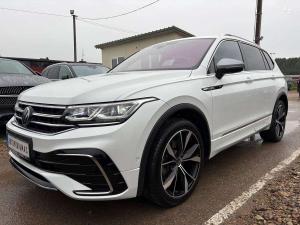 White Volkswagen Tiguan Allspace 2022 in Vilnius, with an engine capacity of 2.00 L and mileage of 130 thousand km for 29800 €, photo  on AUTOMOTO.COM.LV