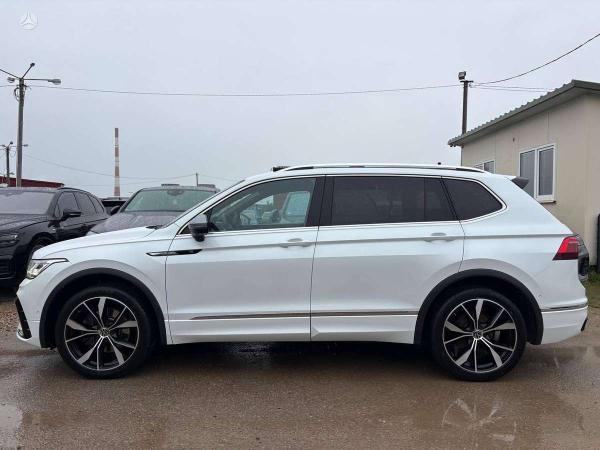 White Volkswagen Tiguan Allspace 2022 in Vilnius, with an engine capacity of 2.00 L and mileage of 130 thousand km for 29800 €, photo 7 on AUTOMOTO.COM.LV