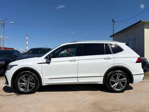 White Volkswagen Tiguan Allspace 2022 in Vilnius, with an engine capacity of 2.00 L and mileage of 202 thousand km for 24300 €, photo 6 on AUTOMOTO.COM.LV