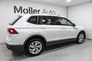 White Volkswagen Tiguan Allspace 2024 in Vilnius, with an engine capacity of 1.50 L and mileage of 32 thousand km for 29200 €, photo 3 on AUTOMOTO.COM.LV