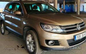 Smilšu krāsa Volkswagen Tiguan 2013 Tallina, ar dzinēja tilpumu 2.00 L un nobraukumu 237 tūkst. km par 10000 €, foto 22 vietnē AUTOMOTO.COM.LV