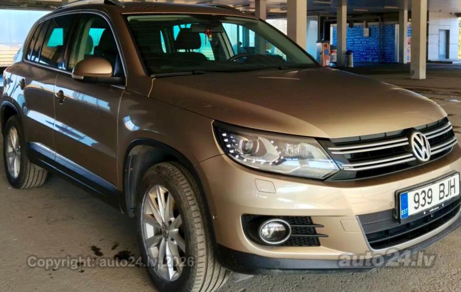 Smilšu krāsa Volkswagen Tiguan 2013 Tallina, ar dzinēja tilpumu 2.00 L un nobraukumu 237 tūkst. km par 10000 €, foto 22 vietnē AUTOMOTO.COM.LV