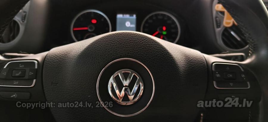 Smilšu krāsa Volkswagen Tiguan 2013 Tallina, ar dzinēja tilpumu 2.00 L un nobraukumu 237 tūkst. km par 10000 €, foto 25 vietnē AUTOMOTO.COM.LV
