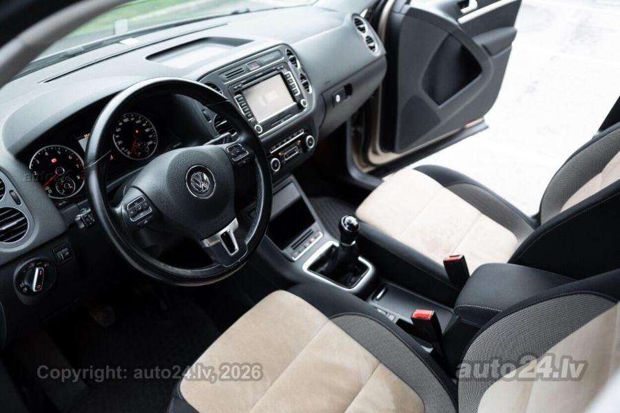 Beige Volkswagen Tiguan 2013 in Tallinn, with an engine capacity of 1.40 L and mileage of 95 thousand km for 8690 €, photo 7 on AUTOMOTO.COM.LV