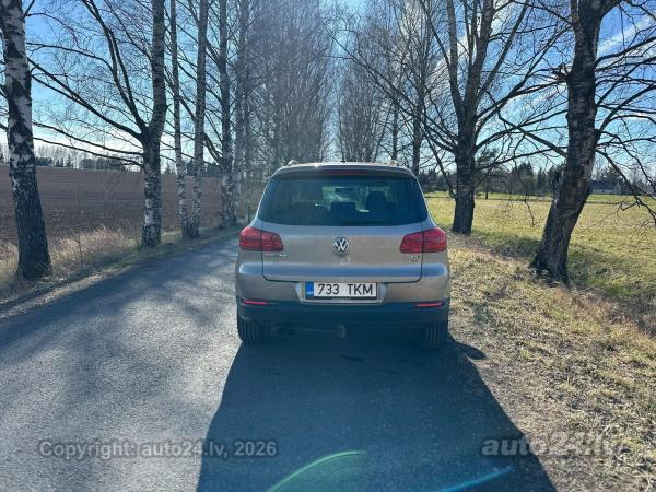 Beige Volkswagen Tiguan 2013 in Tartu, with an engine capacity of 1.40 L and mileage of 74 thousand km for 9900 €, photo 4 on AUTOMOTO.COM.LV