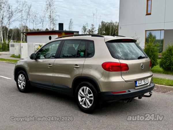 Beige Volkswagen Tiguan 2014 in Tartu, with an engine capacity of 1.40 L and mileage of 224 thousand km for 6990 €, photo 7 on AUTOMOTO.COM.LV