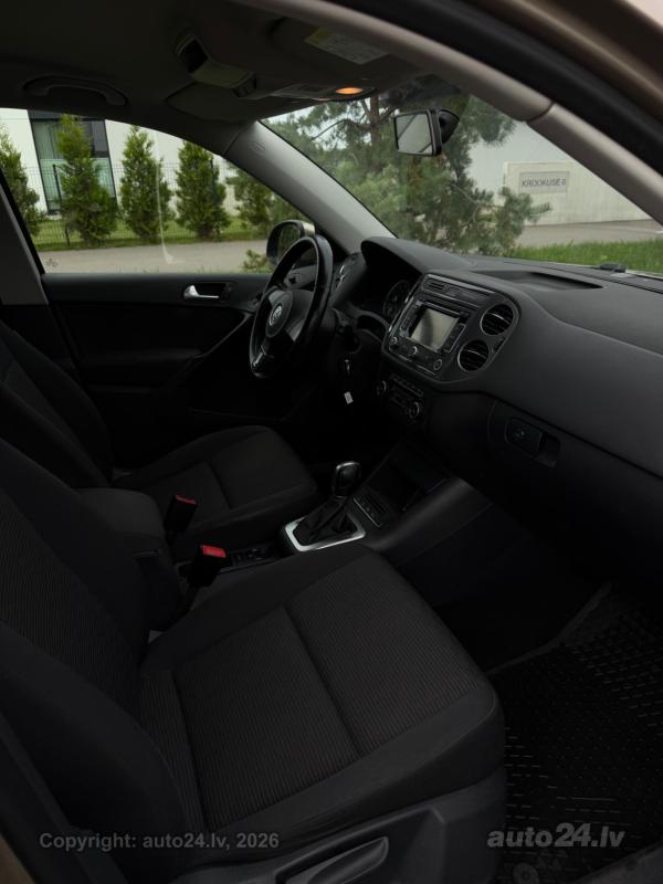 Beige Volkswagen Tiguan 2014 in Tartu, with an engine capacity of 1.40 L and mileage of 224 thousand km for 6990 €, photo 9 on AUTOMOTO.COM.LV