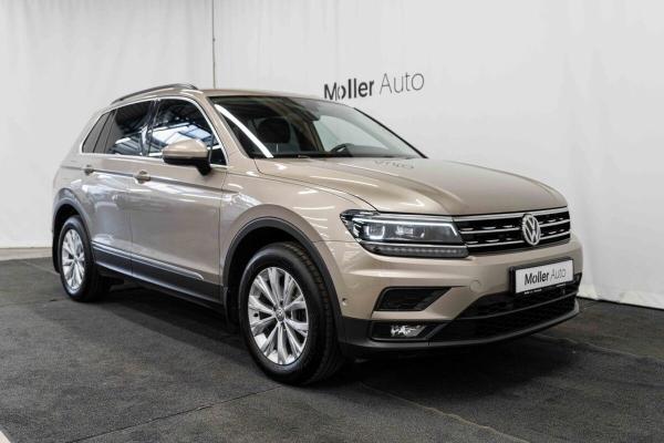 Beige Volkswagen Tiguan 2018 in Tallinn, with an engine capacity of 2.00 L and mileage of 143 thousand km for 18500 €, photo 4 on AUTOMOTO.COM.LV