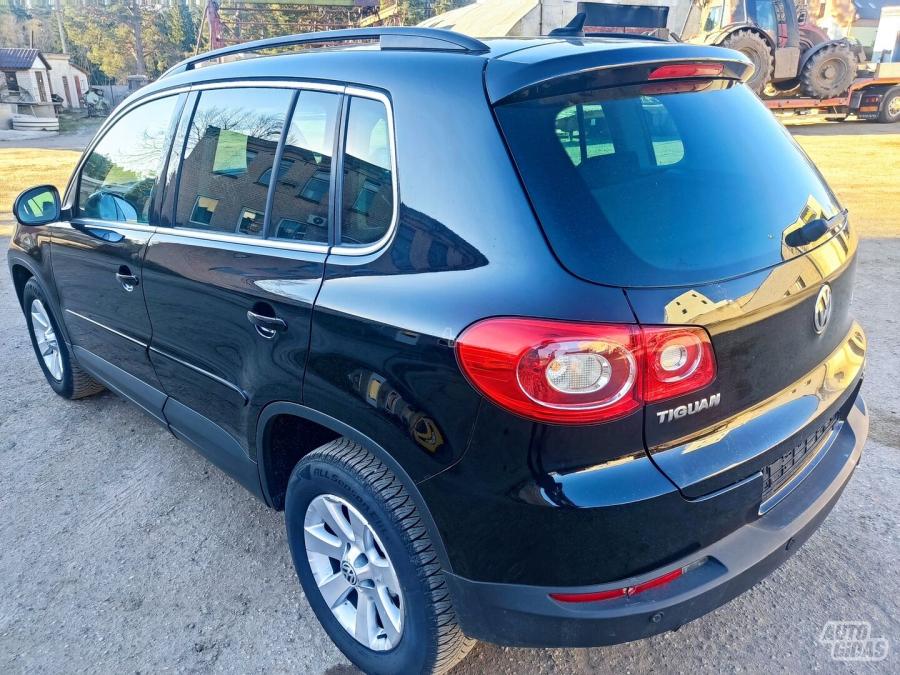 Black Volkswagen Tiguan 2008 in Utena, with an engine capacity of 2.00 L and mileage of 315 thousand km for 5400 €, photo 22 on AUTOMOTO.COM.LV