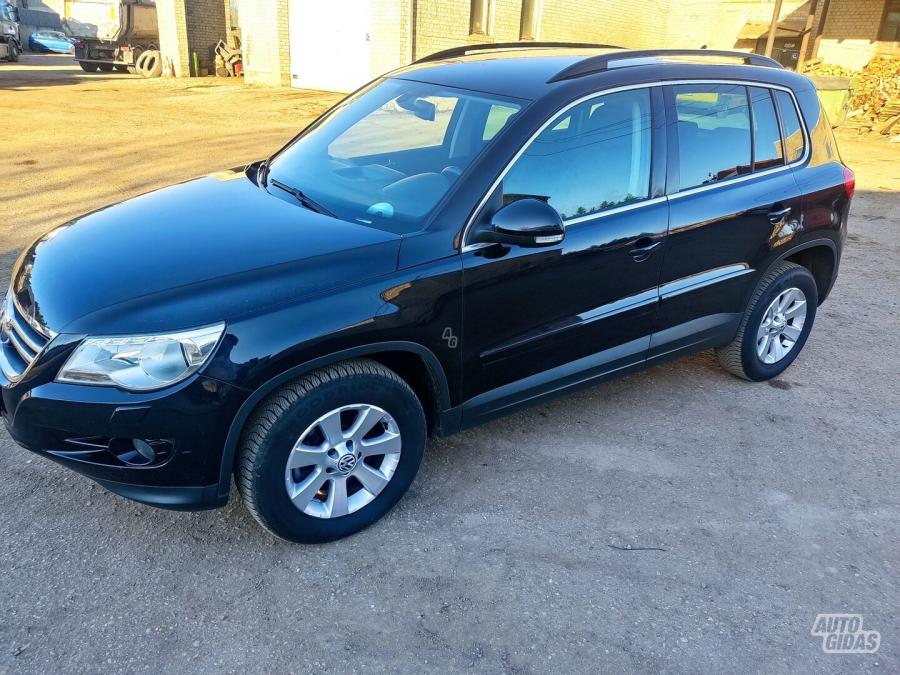Black Volkswagen Tiguan 2008 in Utena, with an engine capacity of 2.00 L and mileage of 315 thousand km for 5400 €, photo 24 on AUTOMOTO.COM.LV