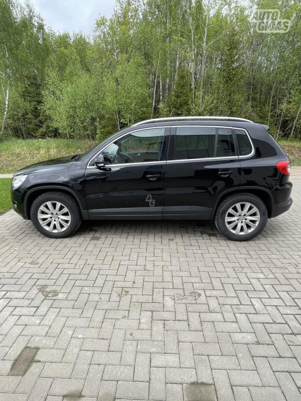 Black Volkswagen Tiguan 2008 in Vilnius, with an engine capacity of 2.00 L and mileage of 334 thousand km for 5300 €, photo 4 on AUTOMOTO.COM.LV