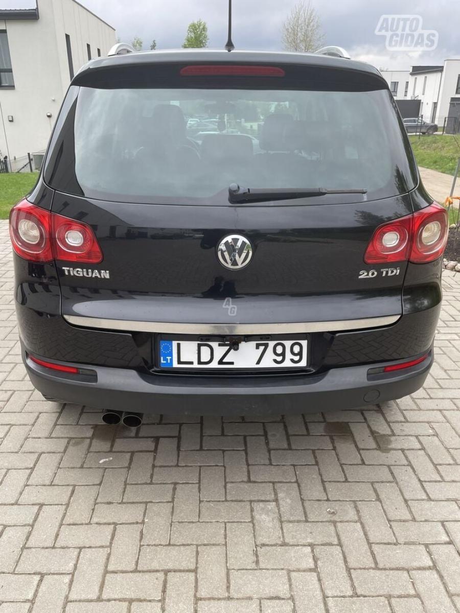 Melns Volkswagen Tiguan 2008 Viļņa, ar dzinēja tilpumu 2.00 L un nobraukumu 334 tūkst. km par 5300 €, foto 7 vietnē AUTOMOTO.COM.LV