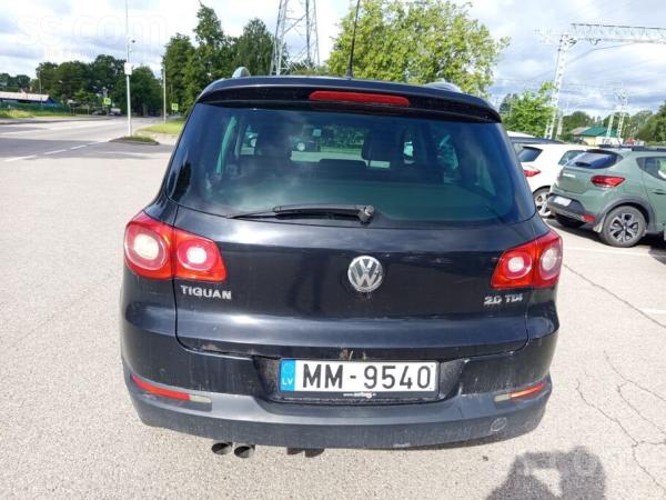 Black Volkswagen Tiguan 2008 in Jurmala, with an engine capacity of 2.00 L and mileage of 308 thousand km for 2600 €, photo 1 on AUTOMOTO.COM.LV