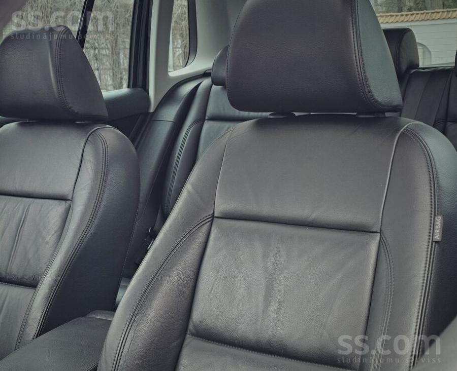 Black Volkswagen Tiguan 2008 in Jelgava, with an engine capacity of 2.00 L and mileage of 247 thousand km for 5990 €, photo 11 on AUTOMOTO.COM.LV