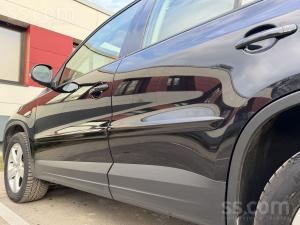 Black Volkswagen Tiguan 2008 in Riga, with an engine capacity of 2.00 L and mileage of 255 thousand km for 6850 €, photo 14 on AUTOMOTO.COM.LV