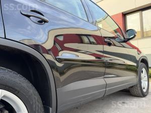 Black Volkswagen Tiguan 2008 in Riga, with an engine capacity of 2.00 L and mileage of 255 thousand km for 6850 €, photo 15 on AUTOMOTO.COM.LV
