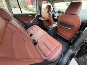 Black Volkswagen Tiguan 2008 in Riga, with an engine capacity of 2.00 L and mileage of 255 thousand km for 6850 €, photo 16 on AUTOMOTO.COM.LV