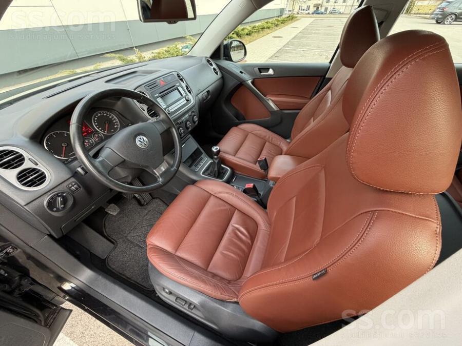 Black Volkswagen Tiguan 2008 in Riga, with an engine capacity of 2.00 L and mileage of 255 thousand km for 6850 €, photo 20 on AUTOMOTO.COM.LV