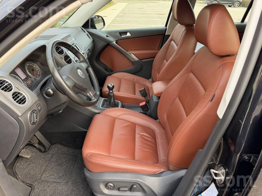 Black Volkswagen Tiguan 2008 in Riga, with an engine capacity of 2.00 L and mileage of 255 thousand km for 6850 €, photo 21 on AUTOMOTO.COM.LV