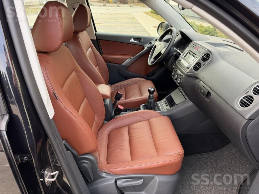 Black Volkswagen Tiguan 2008 in Riga, with an engine capacity of 2.00 L and mileage of 255 thousand km for 6850 €, photo 22 on AUTOMOTO.COM.LV