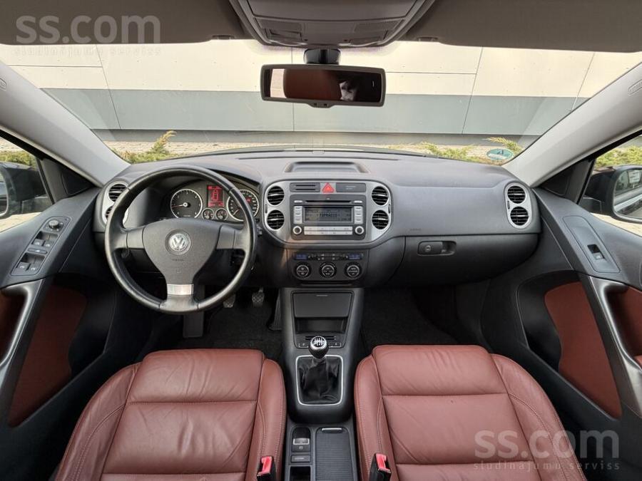 Black Volkswagen Tiguan 2008 in Riga, with an engine capacity of 2.00 L and mileage of 255 thousand km for 6850 €, photo 24 on AUTOMOTO.COM.LV