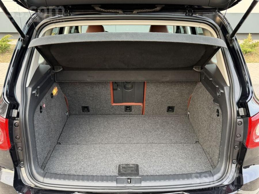 Black Volkswagen Tiguan 2008 in Riga, with an engine capacity of 2.00 L and mileage of 255 thousand km for 6850 €, photo 32 on AUTOMOTO.COM.LV