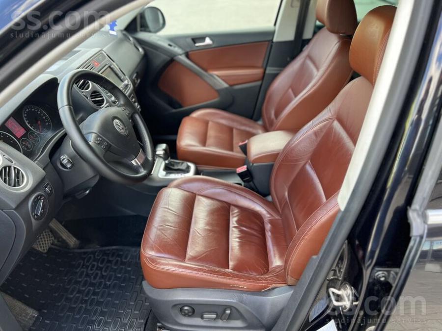 Melns Volkswagen Tiguan 2008 Jēkabpils, ar dzinēja tilpumu 2.00 L un nobraukumu 202 tūkst. km par 6500 €, foto 10 vietnē AUTOMOTO.COM.LV