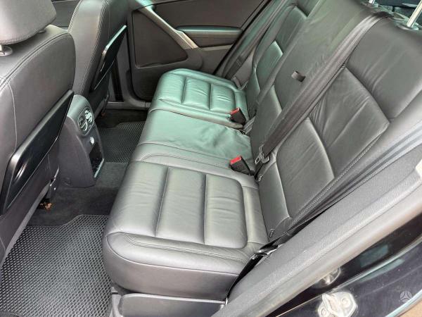 Black Volkswagen Tiguan 2008 in Vilnius, with an engine capacity of 1.98 L and mileage of 212 thousand km for 5690 €, photo 9 on AUTOMOTO.COM.LV