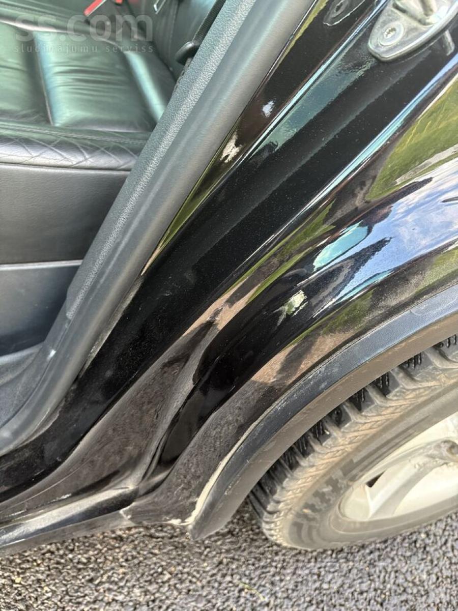 Black Volkswagen Tiguan 2008 in Jelgava, with an engine capacity of 2.00 L and mileage of 175 thousand km for 4950 €, photo 14 on AUTOMOTO.COM.LV