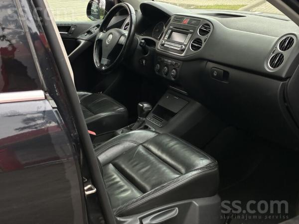 Melns Volkswagen Tiguan 2008 Rīga, ar dzinēja tilpumu 2.00 L un nobraukumu 305 tūkst. km par 4950 €, foto 5 vietnē AUTOMOTO.COM.LV