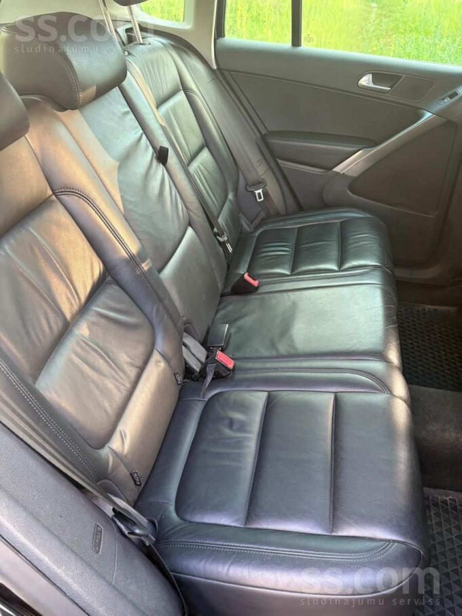 Melns Volkswagen Tiguan 2008 Jelgava, ar dzinēja tilpumu 2.00 L un nobraukumu 162 tūkst. km par 4650 €, foto 12 vietnē AUTOMOTO.COM.LV