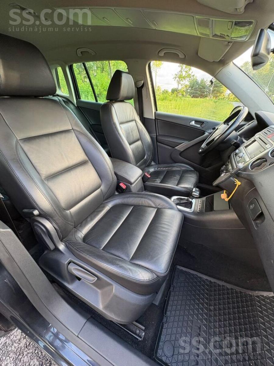 Melns Volkswagen Tiguan 2008 Jelgava, ar dzinēja tilpumu 2.00 L un nobraukumu 162 tūkst. km par 4650 €, foto 13 vietnē AUTOMOTO.COM.LV
