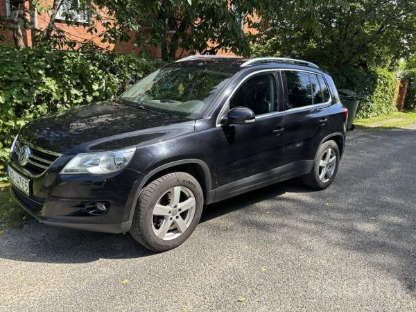 Black Volkswagen Tiguan 2008 in Riga, with an engine capacity of 2.00 L and mileage of 295 thousand km for 4750 €, photo 1 on AUTOMOTO.COM.LV