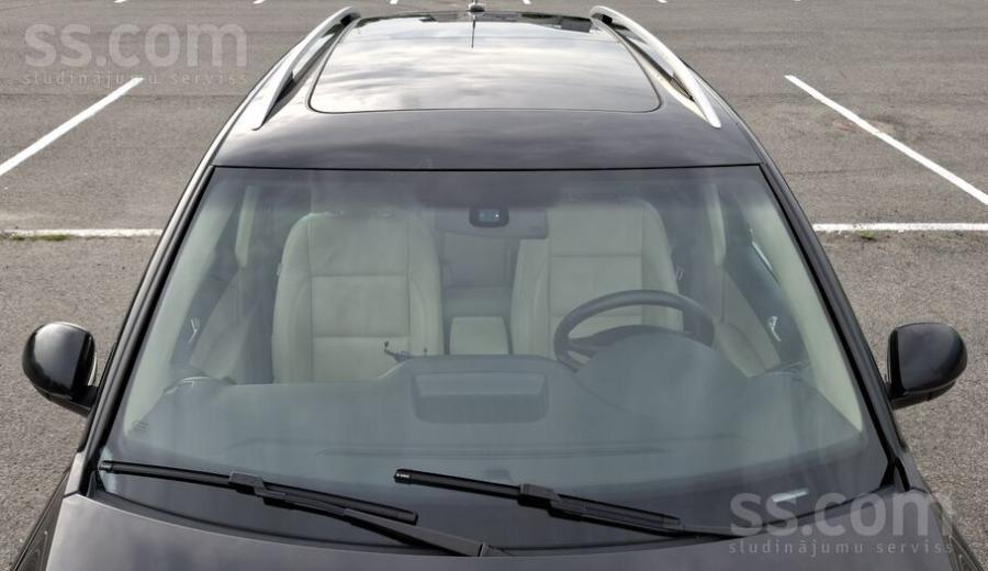 Black Volkswagen Tiguan 2008 in Riga, with an engine capacity of 2.00 L and mileage of 240 thousand km for 7800 €, photo 11 on AUTOMOTO.COM.LV