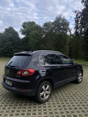 Black Volkswagen Tiguan 2008 in Vilnius, with an engine capacity of 2.00 L and mileage of 289 thousand km for 3300 €, photo 9 on AUTOMOTO.COM.LV