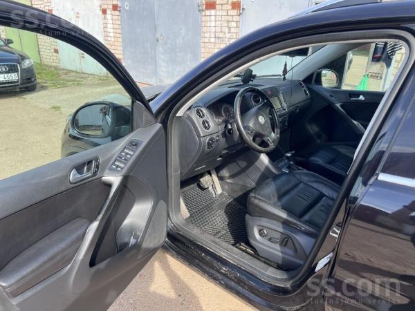 Melns Volkswagen Tiguan 2008 Daugavpils, ar dzinēja tilpumu 2.00 L un nobraukumu 301 tūkst. km par 4200 €, foto 11 vietnē AUTOMOTO.COM.LV