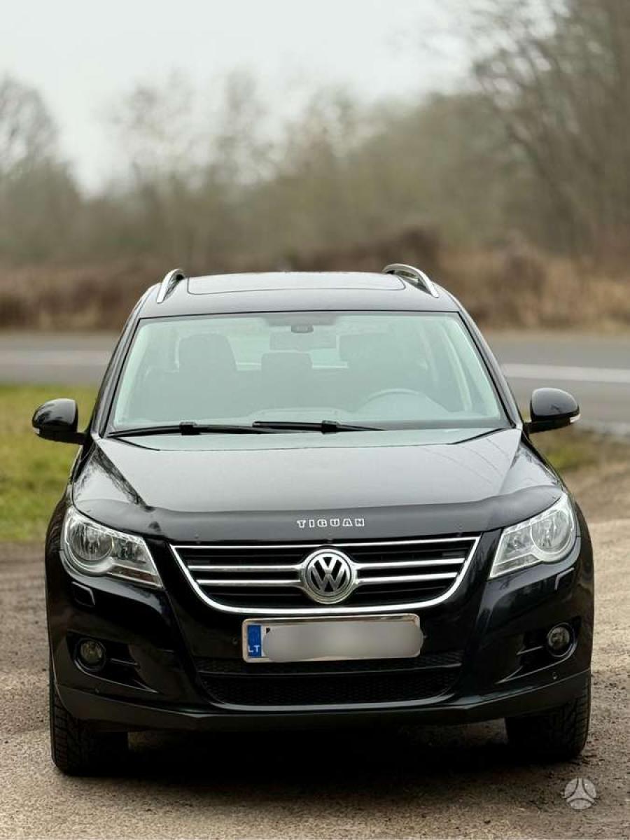 Black Volkswagen Tiguan 2009 in Vilnius, with an engine capacity of 1.97 L and mileage of 309 thousand km for 5500 €, photo 6 on AUTOMOTO.COM.LV