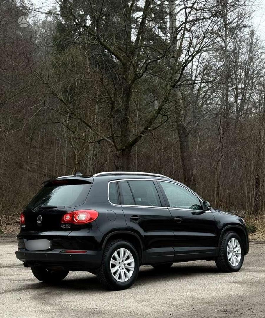 Black Volkswagen Tiguan 2009 in Vilnius, with an engine capacity of 1.97 L and mileage of 309 thousand km for 5500 €, photo 10 on AUTOMOTO.COM.LV