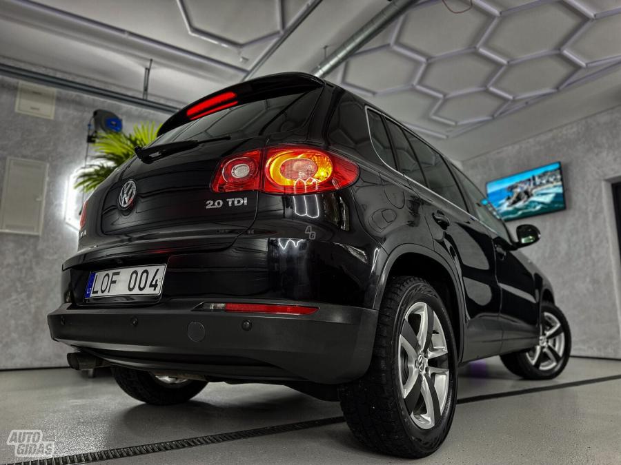 Melns Volkswagen Tiguan 2009 Kauņa, ar dzinēja tilpumu 2.00 L un nobraukumu 261 tūkst. km par 6950 €, foto 20 vietnē AUTOMOTO.COM.LV