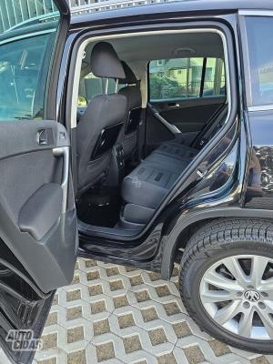 Black Volkswagen Tiguan 2009 in Kaunas, with an engine capacity of 2.00 L and mileage of 256 thousand km for 5700 €, photo 15 on AUTOMOTO.COM.LV