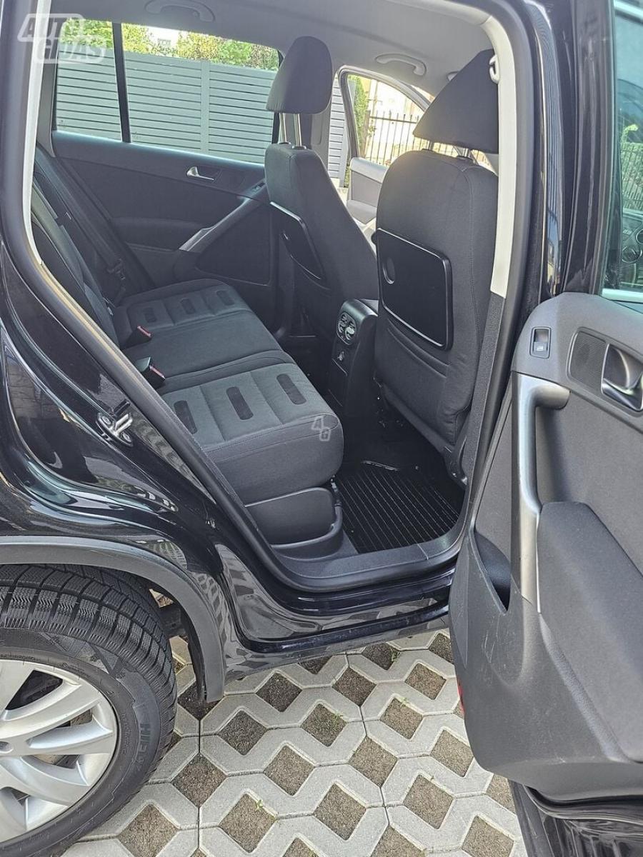 Black Volkswagen Tiguan 2009 in Kaunas, with an engine capacity of 2.00 L and mileage of 256 thousand km for 5700 €, photo 18 on AUTOMOTO.COM.LV