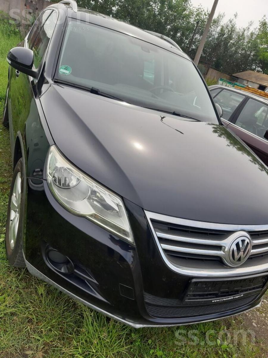 Black Volkswagen Tiguan 2009 in Riga, with an engine capacity of 1.40 L and mileage of 187 thousand km for 5900 €, photo 4 on AUTOMOTO.COM.LV