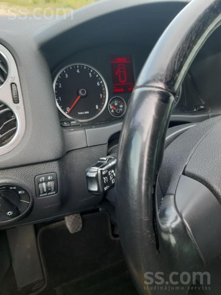 Black Volkswagen Tiguan 2009 in Riga, with an engine capacity of 1.40 L and mileage of 187 thousand km for 5900 €, photo 11 on AUTOMOTO.COM.LV