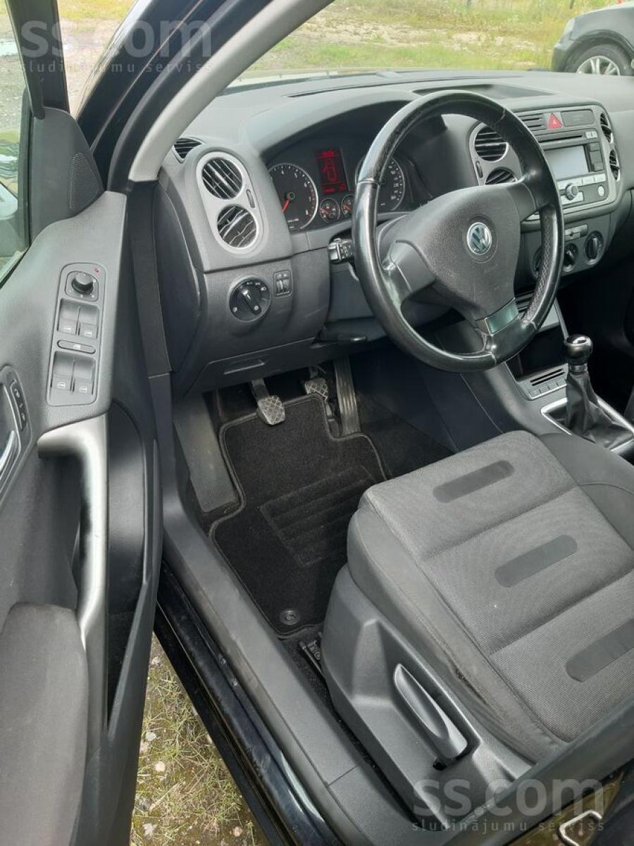 Black Volkswagen Tiguan 2009 in Riga, with an engine capacity of 1.40 L and mileage of 187 thousand km for 5900 €, photo 12 on AUTOMOTO.COM.LV