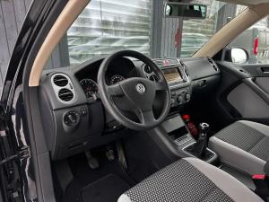 Black Volkswagen Tiguan 2009 in Jelgava, with an engine capacity of 1.40 L and mileage of 175 thousand km for 6690 €, photo 9 on AUTOMOTO.COM.LV