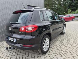 Black Volkswagen Tiguan 2009 in Taurage, with an engine capacity of 2.00 L and mileage of 231 thousand km for 5200 €, photo 6 on AUTOMOTO.COM.LV