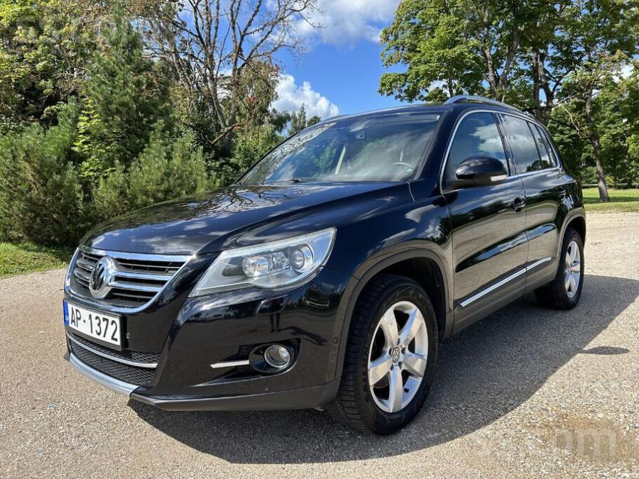 Black Volkswagen Tiguan 2009 in Riga, with an engine capacity of 2.00 L and mileage of 327 thousand km for 5590 €, photo 1 on AUTOMOTO.COM.LV