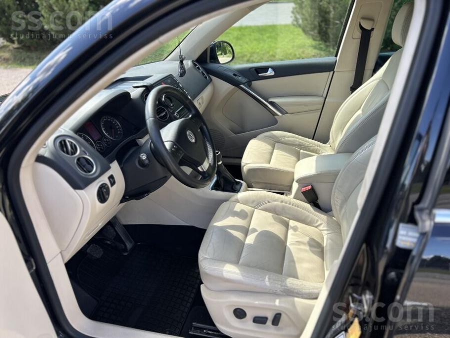 Black Volkswagen Tiguan 2009 in Riga, with an engine capacity of 2.00 L and mileage of 327 thousand km for 5590 €, photo 9 on AUTOMOTO.COM.LV