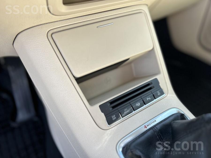 Black Volkswagen Tiguan 2009 in Riga, with an engine capacity of 2.00 L and mileage of 327 thousand km for 5590 €, photo 12 on AUTOMOTO.COM.LV